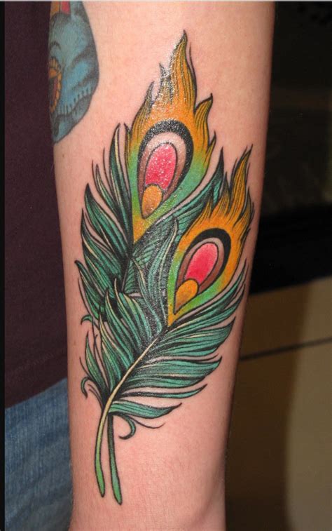 Peacock Feather Tattoo Meaning A Symbol Of Beauty And Glory
