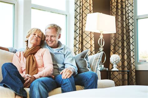 Relax Love And Mature Couple On Sofa Hug For Bonding Healthy Relationship And Marriage