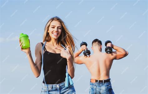 Premium Photo Slim Woman Trainer Of Fitness With Protein Shaker Smiling Young Female And