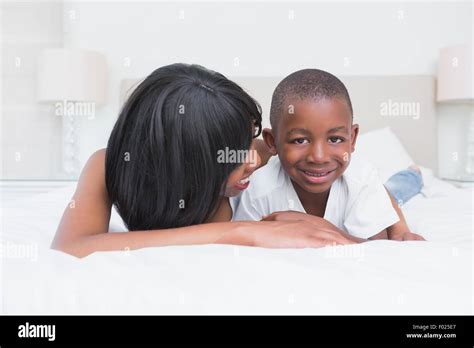 Pretty Mother With His Son In Bed Stock Photo Alamy
