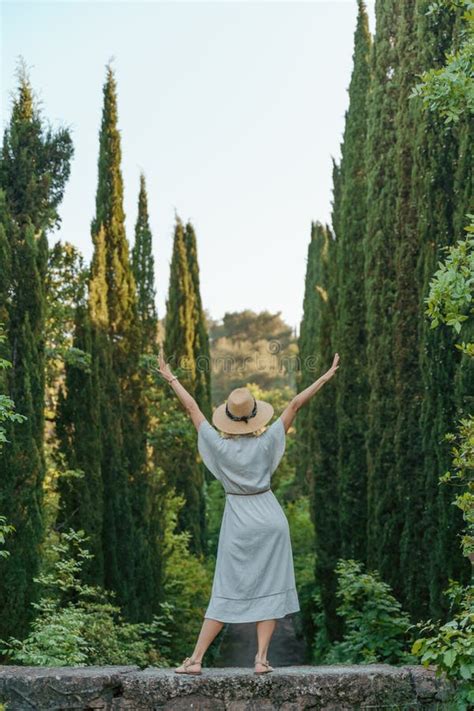 Happy Woman Wearing A Fedora Hat While Standing In The Woods Stock Image Image Of Wearing