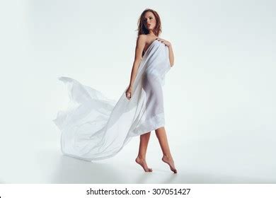 Naked Woman Transparent Cloth Looking Camera Stockfoto
