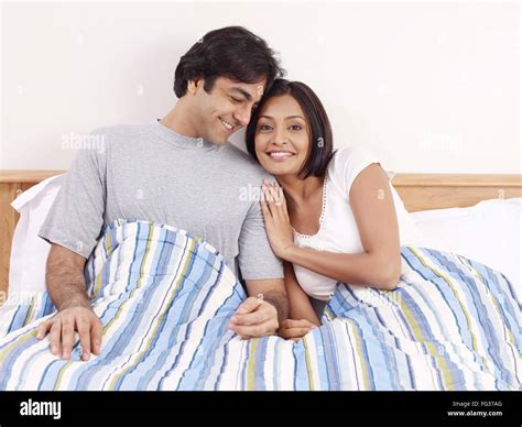 Indian Husband Wife Relaxing At Bedroom Hi Res Stock Photography And