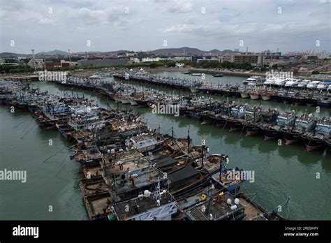 Aerial Photo Shows Fishing Vessels Anchoring At A Harbor To Avoid