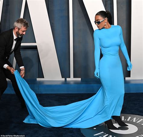 Kim Kardashian Rocks A Figure Hugging Blue Dress And Trendy Shades At The Exclusive 2022 Vanity