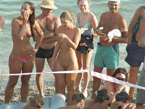 Porn Image Nude Girls At Beach Among Clothed People 131720692