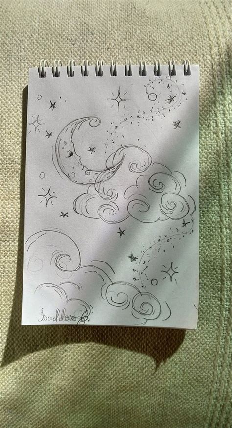 A Notebook With Some Drawings On It