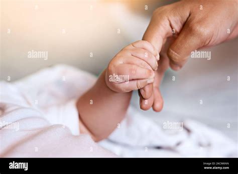 When A Baby Grips Your Finger Priceless Mother Holding Her Newborn