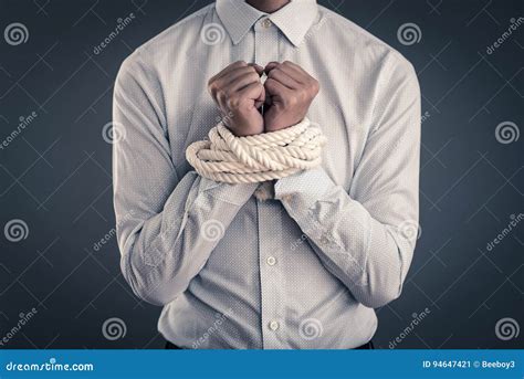 Businessman Who Are Tied Up With Ropes Stock Image Image Of Hands Fissure 94647421