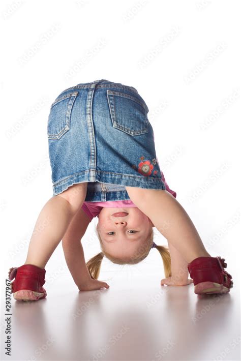 little girl showing her butt Stock 写真 Adobe Stock