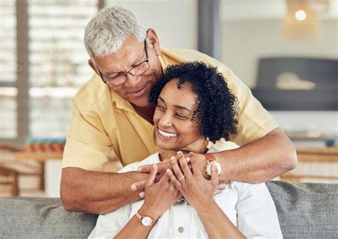 Premium Photo Love Relax And Senior Couple Hug Care And Enjoy Quality Bonding Time On Home