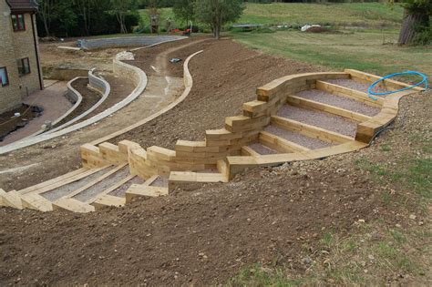 How To Build A Curved Retaining Wall With Sleepers Design Talk