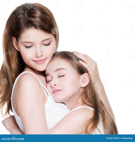 Beautiful Young Mother With A Small Daughter 8 Years Embrace Each Other Stock Image Image Of