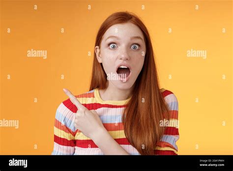 Impressed Speechless Young Redhead 20s Girl Drop Jaw Gasping Amused Wide Eyes Staring Camera