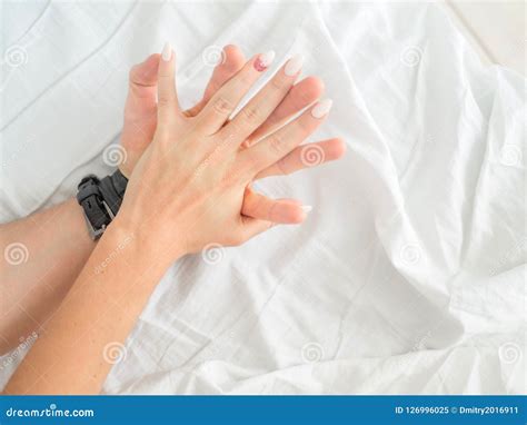 Couple Making Love In Bed Focus On Hands Stock Image Image Of Emotion White 126996025