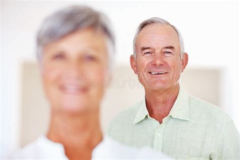 Smiling Mature Woman And Man Together Having A Good Time Closeup Portrait Of A Smiling Mature