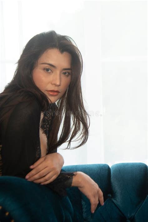 Sensual Dresses Asian Women Sensuality Arm On The Blue Sofa Stock Image Image Of Sofa Adult