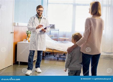 Mother And Son Visiting Doctor Stock Image Image Of Healthcare
