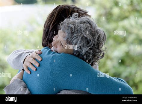 Loving Son Hugging His Mother Stock Photo Alamy